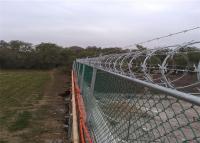 China Cbt -60 Concertina Razor Barbed Tape Wire On Chain Link Fence Razor Fence for sale