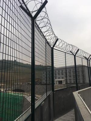 China Durable Barbed Tape Stainless Steel Razor Wire Punched Tape Concertina Coil for sale