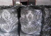 China Fence Flat Wrap Razor Wire Connected By Clips , Razor Blade Barbed Wire for sale
