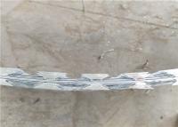 China Single Loop Cross Loops 220g/M2 Barbed Concertina Wire With Blades for sale