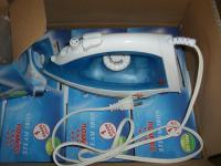 China 220V Industrial Electric Iron with 100ml Water Tank Capacity for Professional Steam Applications for sale
