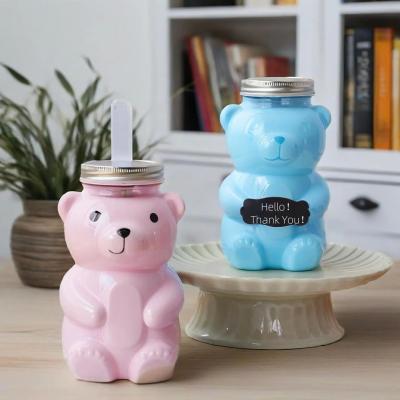 China Hot-Selling 500ml Creative Bear Panda Shaped Plastic Drinks Container Milk Tea PET Juice Beverages Candy Bottle With Screw Cap for sale