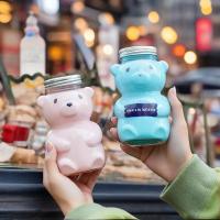 China Hot-Selling 500ml Creative Bear Panda Shaped Plastic Drinks Container Milk Tea PET Juice Beverages Candy Bottle With Screw Cap for sale
