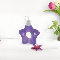 China Custom Shape Plastic Juice Bottle 550ml PP Donut Shaped Juice PETG Milk Tea Plastic Bottle with Pull Ring Lid for sale