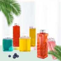 China French Square Plastic Juice Bottle 20OZ Beverage Fruit Juice Easy Open Lid Tamper Proof Cap for Energy Drinks for sale