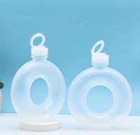 China Round Shaped Beverage Bottle Customized Printed logo 16oz 500ml Juice PP Donut Bottle with Ring Lid for sale