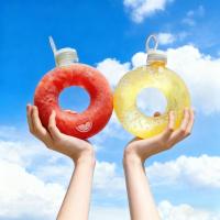 China Round Shaped Beverage Bottle Customized Printed logo 16oz 500ml Juice PP Donut Bottle with Ring Lid for sale