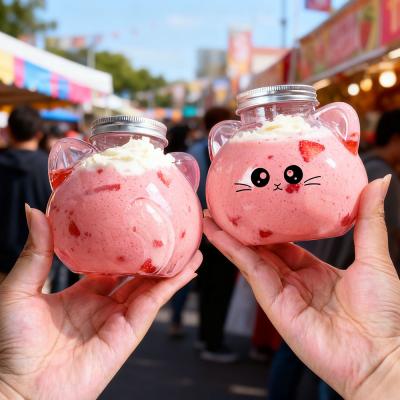 China Factory Wholesale Production of 700ml Heart Shape Beverage Juice Bottle With Screw Lid for sale