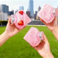 China Factory Wholesale Production of 700ml Heart Shape Beverage Juice Bottle With Screw Lid for sale