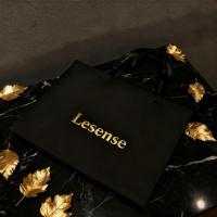 China Redefine Luxury Packaging Custom Branded Black Paper Gift Bags for sale