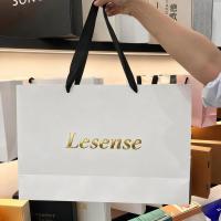 China Gold Foil White Gift Paper Bags — Subtle Luxury in Every Detail for sale