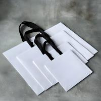 China Gold Foil White Gift Paper Bags — Subtle Luxury in Every Detail for sale