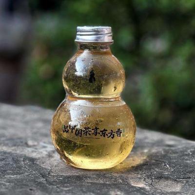 China Trend Gourd Shaped Round Bottom PET Plastic Cold Drink Tea Juice Bottles with Aluminum Cap for sale