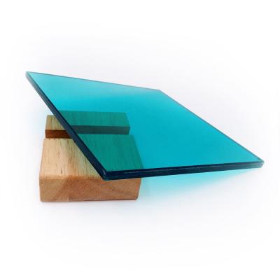China Dark Blue Reflective Glass Tinted Coated Commercial Building Glass for sale