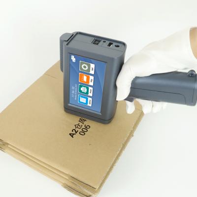 China Automatic Handheld 600dpi Inkjet Printer for Bottle Bag Carton Package & Date Code for Product Label Printing for sale
