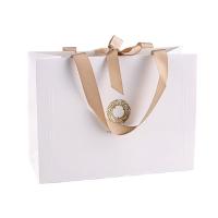 China Custom Printed Paper Gift Bag Made From Recyclable Materials Suitable For Retail Shops And Event Packaging for sale