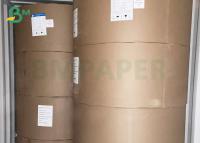 China 0.55MM Washable Brown And White Kraft Paper Fabric With Roll Packaging for sale