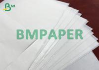 China 40g 50g One Side Glossy Coated White Kraft Paper For Packaging for sale