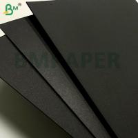 China 300g 400g Printability Fold Resistance Double Sided Black Cardboard For Hardcover Book Covers Business Cards for sale