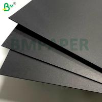 China 300g 400g Printability Fold Resistance Double Sided Black Cardboard For Hardcover Book Covers Business Cards for sale