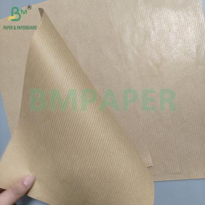 China 50gsm 60gsm One Side Glossy Brown Striped Kraft Paper For Making Hangbag for sale