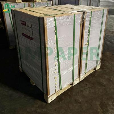 China 30g Food Grade Wax Coated Paper For Candy Wrap Non - Stick 30 x 30cm Oilproof for sale
