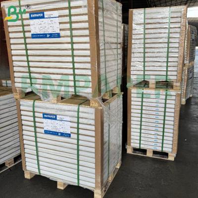 China 35g 40g White One Side Gloss MG Kraft Paper In Roll 1100mm For Packing for sale