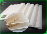 China Heat Resistant Large Craft Paper Roll , 31 gsm 35gsm Food Grade Baking Paper Roll for sale