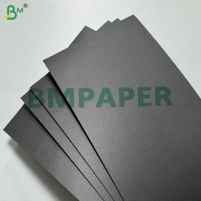 China Smooth Surface Premium 250gsm 300gsm Black Paperboard Ideal for Gift Boxes and Rigid Packaging for sale