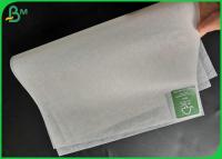 China 31gsm 35gsm 40gsm White Kraft Paper Roll Food Grade Greaseproof Baking Paper for sale