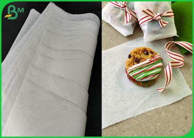China 31gsm 35gsm 40gsm White Kraft Paper Roll Food Grade Greaseproof Baking Paper for sale