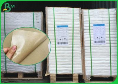 China 10G/ 12G PE Coated Glossy Paper Waterproof Brown Kraft Paper Coils 700MM 1000MM for sale