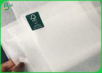 China Jumbo Roll 40GSM 50GSM Bleached MG White Paper For Sandwiches Packaging for sale