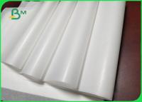 China 50 / 55 / 60GSM Bleached MG Coated Paper With FDA Certification Rolls Packing for sale