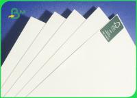 China 70 * 100cm 210gsm 220gsm 260gsm Food Grade White Art Card For Food Packages for sale
