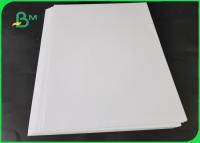 China 53gsm Woodfree Paper Grade A Long Grane 70 * 100cm High Brightness Reams for sale