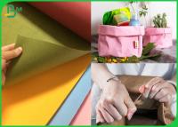 China 0.55mm Degradable Pink Color Washable Kraft Fabric For Paper Bags for sale