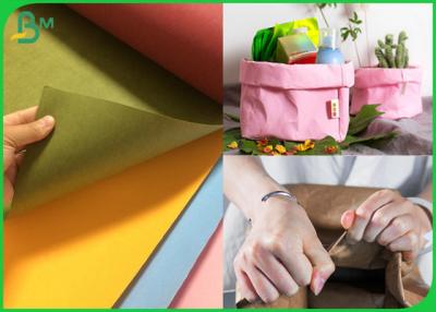 China 0.55mm Degradable Pink Color Washable Kraft Fabric For Paper Bags for sale