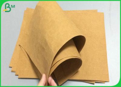 China Durable 0.55mm Thickness Brown Prewashed Kraft Fabric Material For Bags for sale