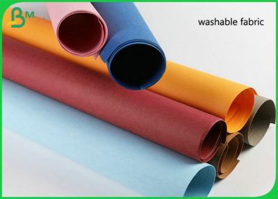 China 0.3mm 0.55mm Thickness Washable Kraft Fabric For Bags Making for sale