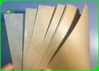 China Natural Wood Pulp 40gsm + 10g PE Coated Brown Kraft Paper For Wrapping Baguette for sale