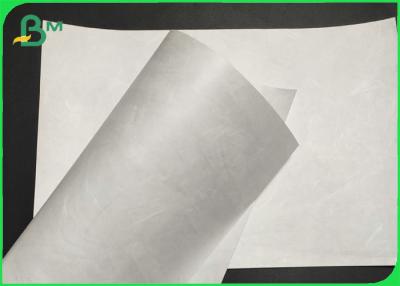 China Tear Resistant 42.5gsm 55gsm Fabric Paper Rolls For High Tenacity Wristband for sale