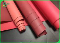 China 0.3mm 0.55mm Recyclable Red Kraft Paper Fabric Rolls Washable Handbags Material for sale