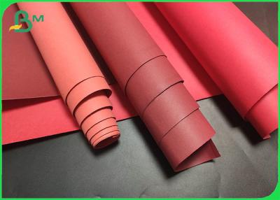 China 0.3mm 0.55mm Recyclable Red Kraft Paper Fabric Rolls Washable Handbags Material for sale