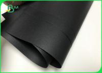 China 110gsm To 170gsm Double Sides Solid Black Craft Paper Rolls For Clothes Tag for sale