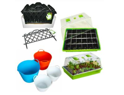China Plastic Mini Greenhouse Seedling Propagator with Lids 50 Cell Nursery Tray for sale
