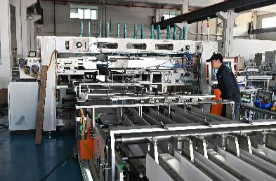 China 10min Tissue Paper Converting Machine , 35packs/Min Tissue Paper Manufacturing Machine for sale