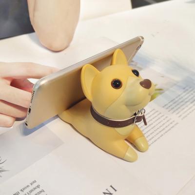 China Customized Color Cute Cell Phone Desk Holder Non Phthalate PVC Dog Phone Stand for sale