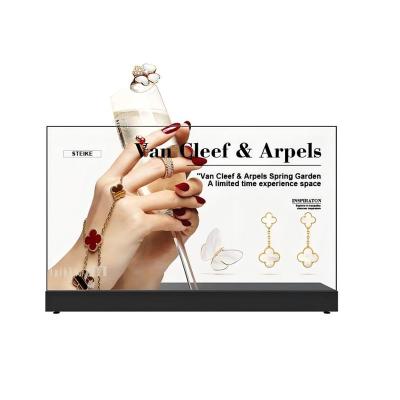 China 77 Inch Transparent OLED Display Interactive 3D Touch Transparent Digital Signage for Commercial Applications for sale
