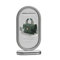 China 55 Inch Oval Transparent OLED Interactive Digital Signage for Creative Retail and Brand Spaces for sale
